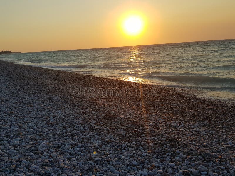 Rhodes Sunset Sea Beach Relax Pebbles Stock Photo - Image of pebbles ...