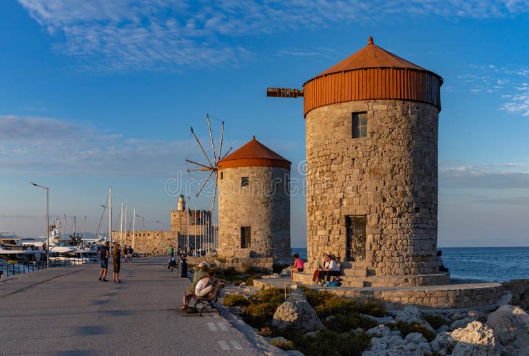 Rhodes Windmills stock photo. Image of vegetation, street - 368631256