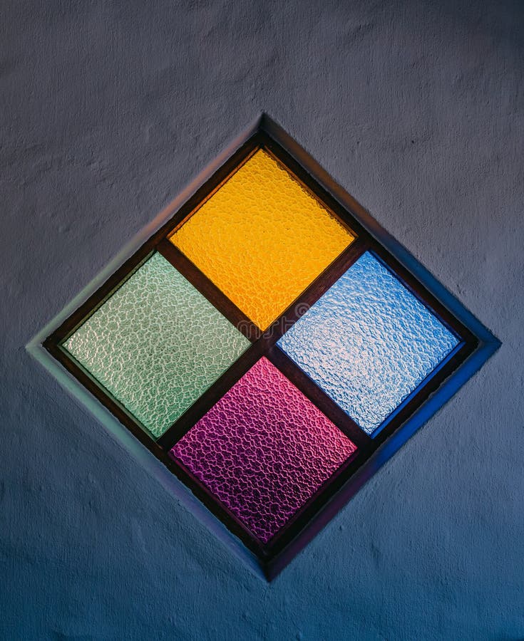 Rhombus Shape Stained Glass Window is Embedded in Gray Wall Rough Stock ...