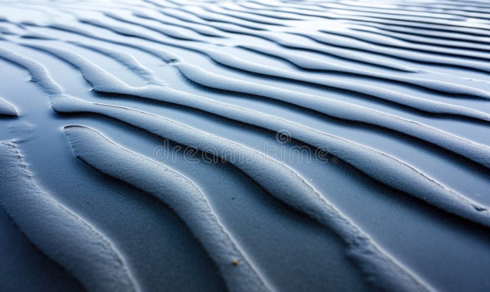 Rhythmic Patterns Carved by the Tide Create a Beautiful Texture on a ...