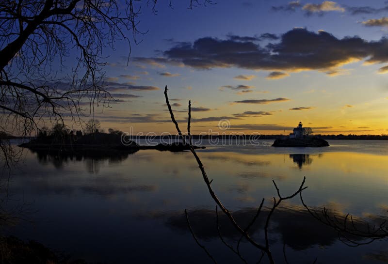 RI Sunset Lighthouse stock photo. Image of water, color - 17251174