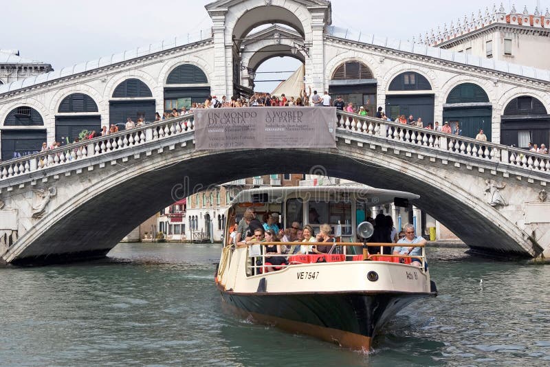 Rialto Bridge and Water Bus Editorial Photo - Image of town, tourism ...