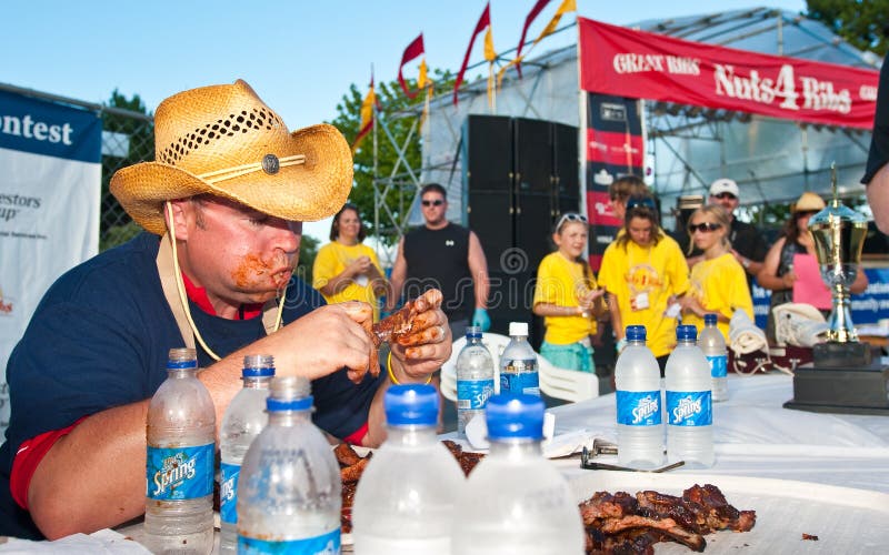 Rib Eating Contest for Charity. Editorial Stock Photo - Image of ...