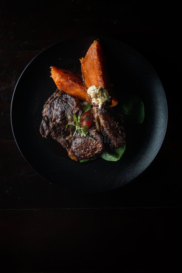 Rib eye dish with garnish stock image. Image of grilled - 254640909