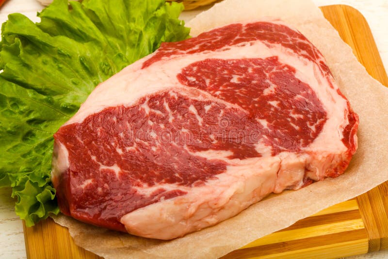 Rib eye raw steak stock image. Image of beef, black - 112079207