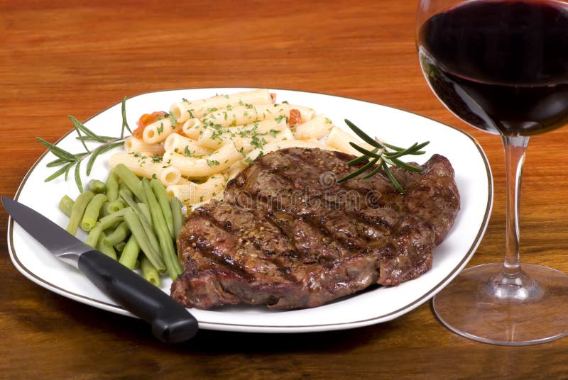 Rib Eye Steak Dinner 1 stock photo. Image of bone, sirloin - 1910428