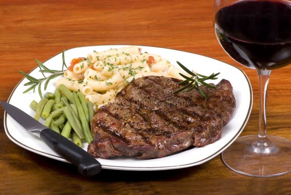 Rib Eye Steak Dinner 1 stock photo. Image of bone, sirloin - 1910428