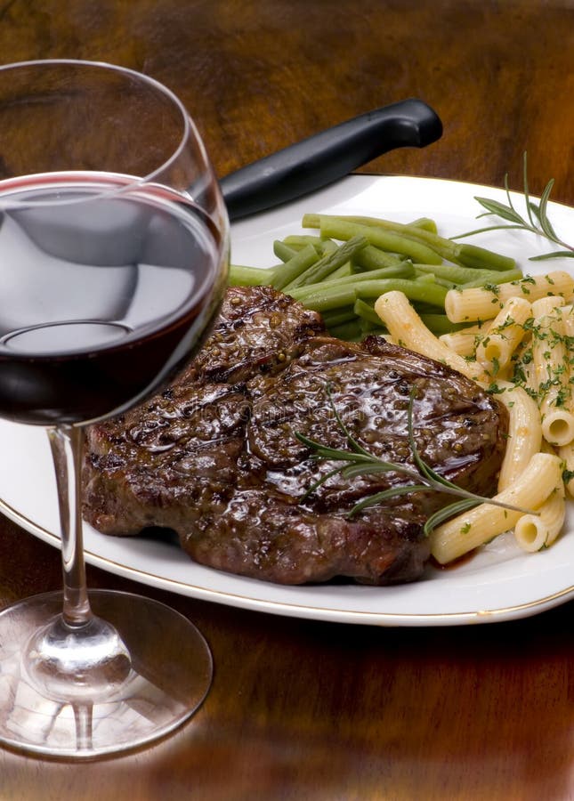 Rib Eye Steak Dinner 4 stock photo. Image of glass, pasta - 1910476