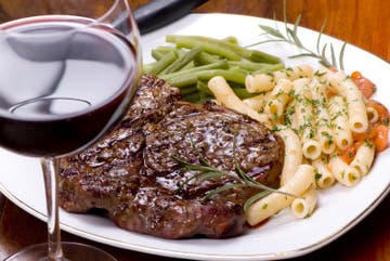Rib Eye Steak Dinner 5 stock photo. Image of medium, bone - 1912908