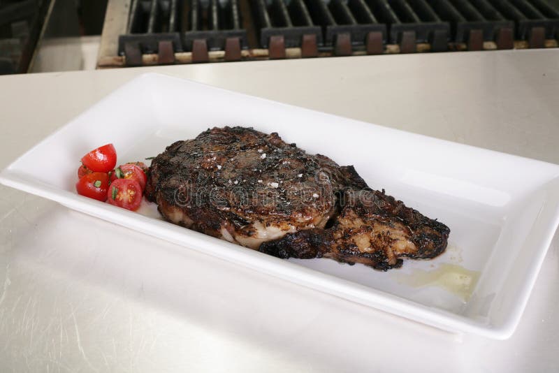 Rib-eye Steak Resting on the Plate Stock Photo - Image of beef, cooked ...