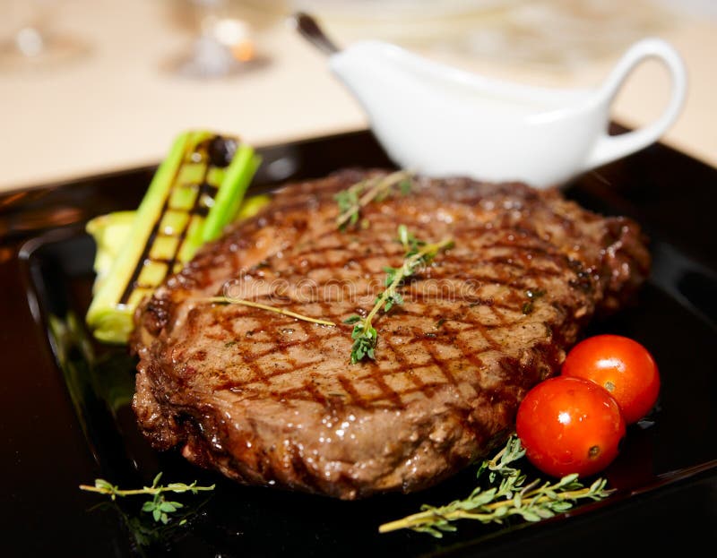 Rib Eye Steak Dinner 5 stock photo. Image of medium, bone - 1912908
