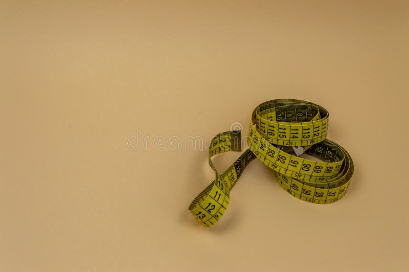 Ribbon Centimetre on a Yellow Background Close-up Stock Photo - Image ...