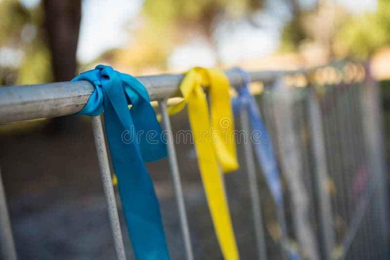 Ribbons Tied on a Railing in the Park Stock Photo - Image of metal ...
