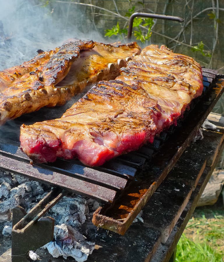 Ribs on the grill stock image. Image of delicious, fire - 28577693