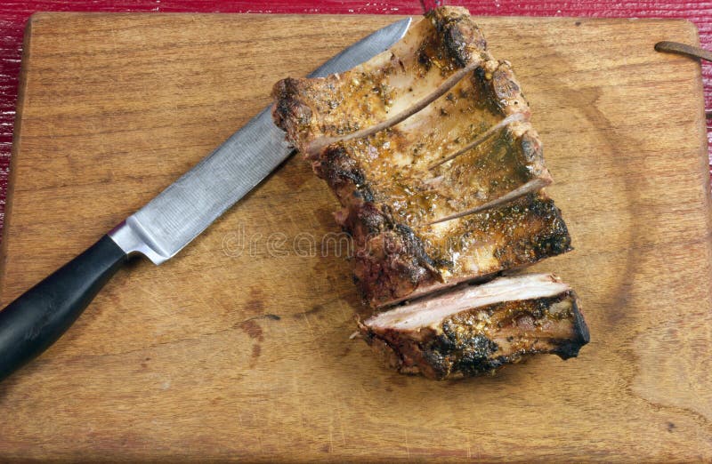 Ribs and Knife on a Cutting Board Stock Photo - Image of blade, meal ...