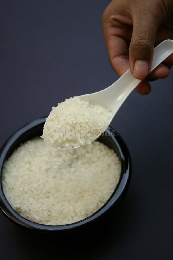 Handful of Rice Isolated with Stock Photo - Image of human, crumbly ...