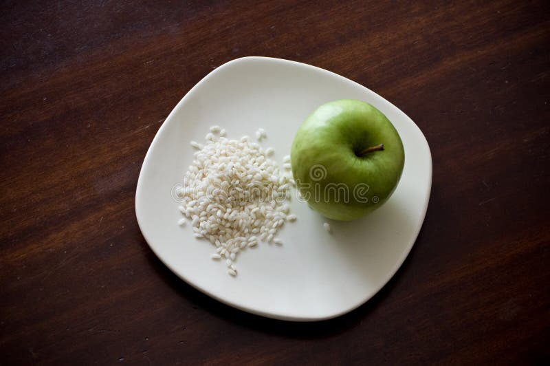 Rice and apple stock photo. Image of weight, table, rice - 8208114