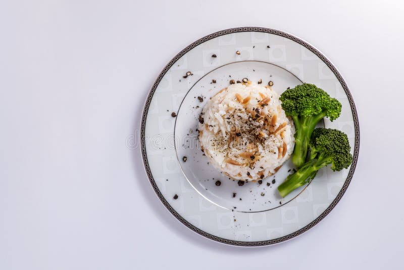 Rice with Barley Noodles and Fresh Broccoli on the Plate Stock Photo ...
