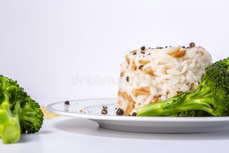 Rice with Barley Noodles and Fresh Broccoli on the Plate Stock Image ...