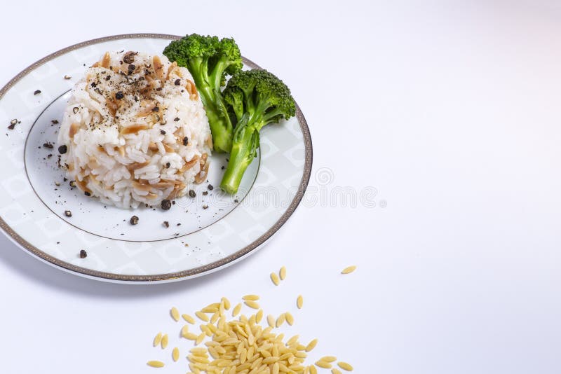 Rice with Barley Noodles and Fresh Broccoli on the Plate Stock Photo ...