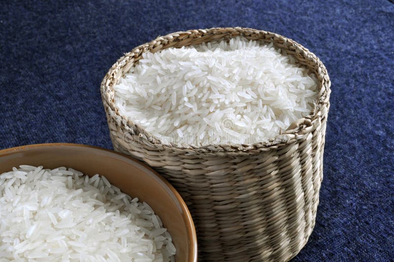 Rice in small baskets stock photo. Image of bamboo, hunger - 13873352