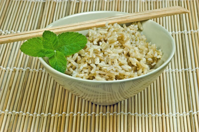 Rice Bowl on Bamboo Mat with Chopsticks Stock Photo - Image of ...
