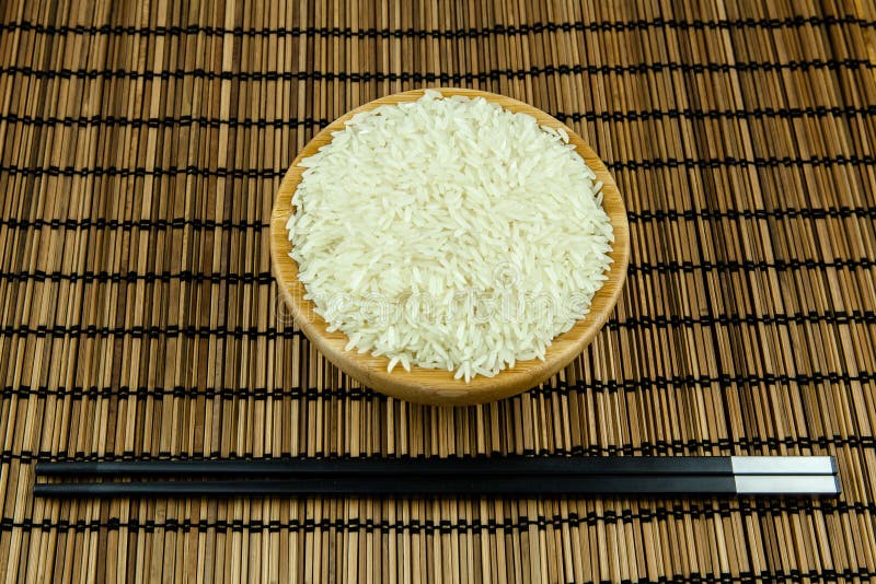 Rice in Bowl with Chopsticks on Traditional Asian Plate Mat Stock Image ...