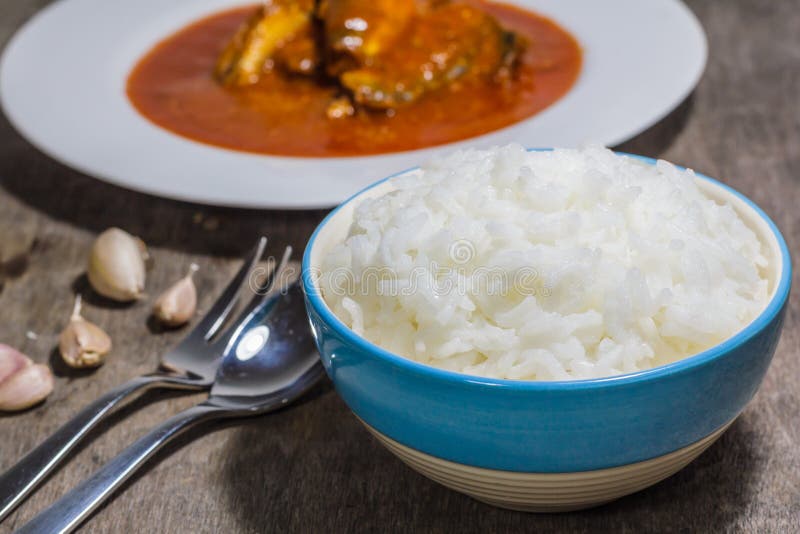Rice in a bowl on table stock photo. Image of traditional - 79473898