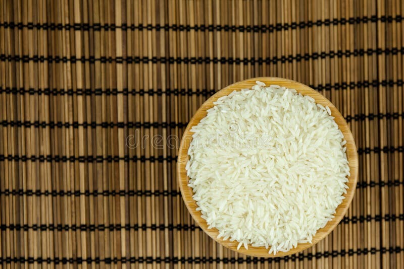 Rice in the Bowl on Traditional Asian Plate Mat. Stock Image - Image of ...