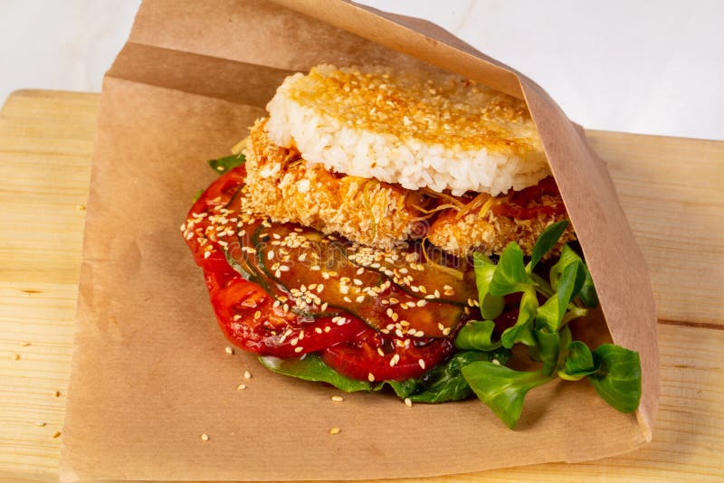 Rice burger with chicken stock image. Image of black - 122361333