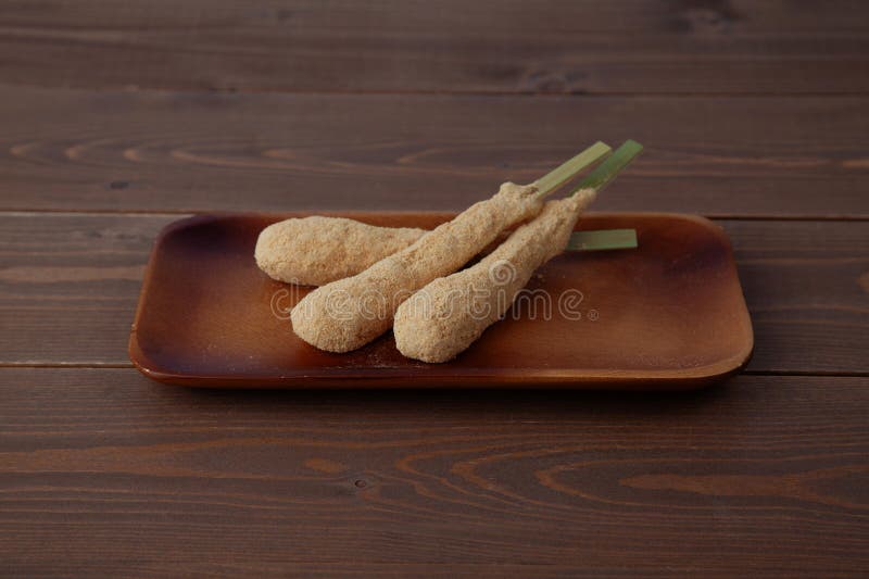 Rice Cakes Covered with Sweet Soybean Flour Isolated on Table Stock ...