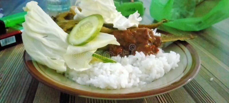 Rice and Chicken Pecel on a Table in Bumiayu Brebes, Central Java ...
