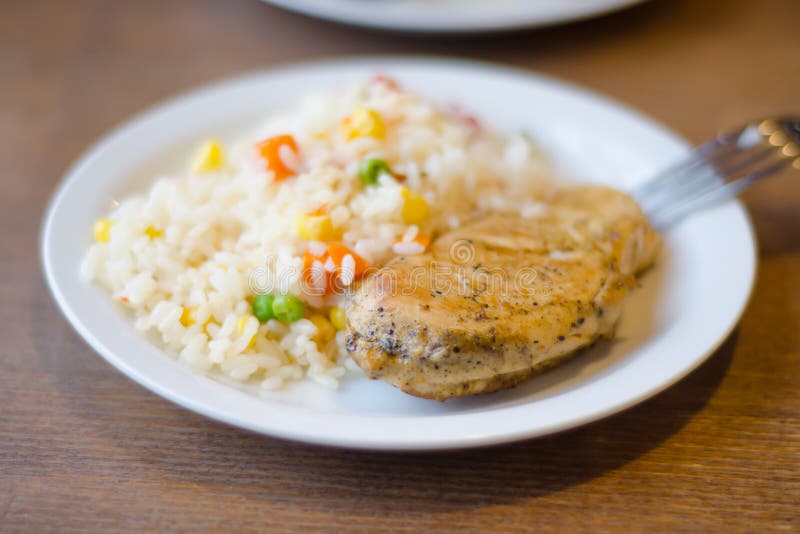 Rice with Chicken Steak on a Plate Stock Photo - Image of appetizer ...