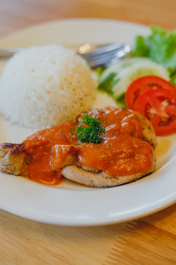 Rice with chicken steak stock photo. Image of steak, dish - 99416848
