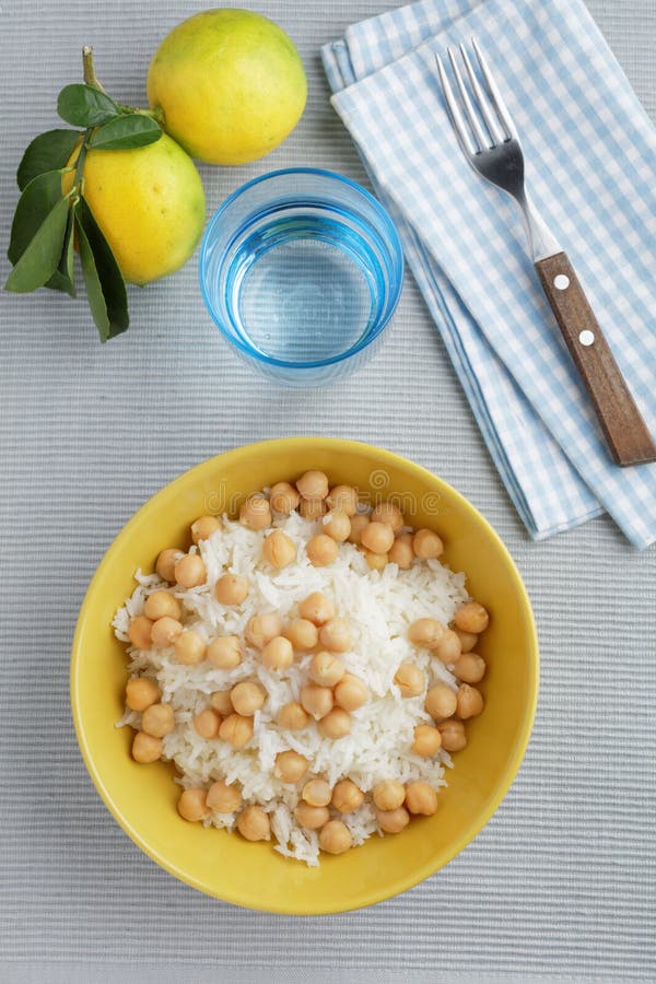 Rice with chickpeas stock image. Image of portion, yellow - 99645367
