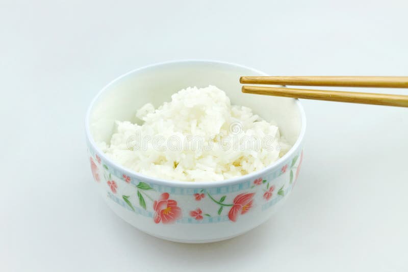 Rice and chopsticks stock image. Image of bowl, staple - 13747127