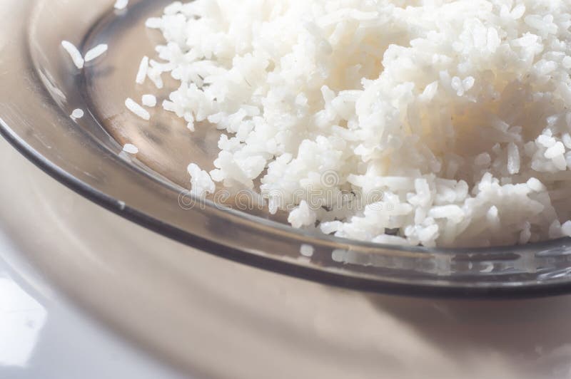 Rice Cooked on a Black Plate with Copy Space Stock Image - Image of ...