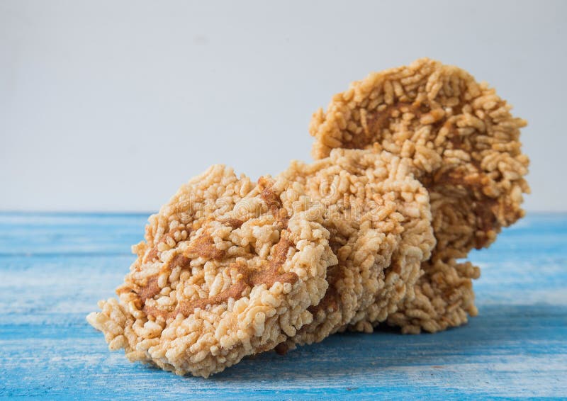 Rice Crackers on Blue Wooden Floor. Stock Image - Image of white, snack ...