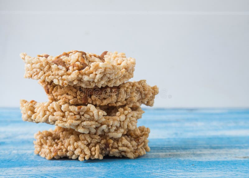 Rice Crackers on Blue Wooden Floor. Stock Image - Image of isolated ...