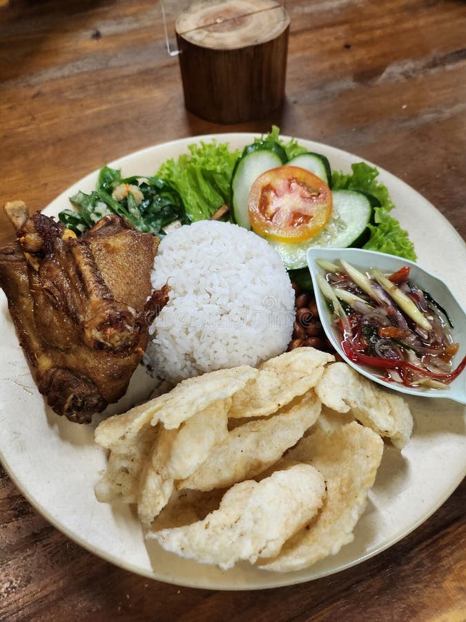 Rice and Crispy Duck with Union Sauce Stock Image - Image of crispy ...