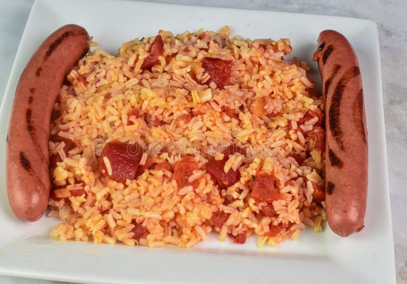Rice with Diced Tomatoes with Hot Dogs Stock Image - Image of meal ...