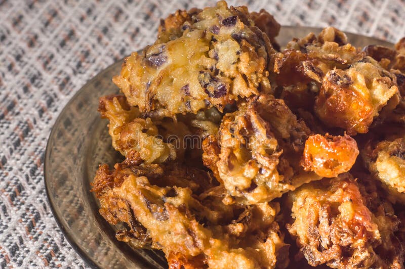 Rice Dumplings, Fritter Made with Red Onion on a Black Plate with ...
