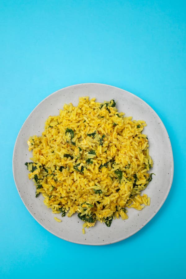 Rice with Egg and Spinach on Plate Stock Photo - Image of closeup ...
