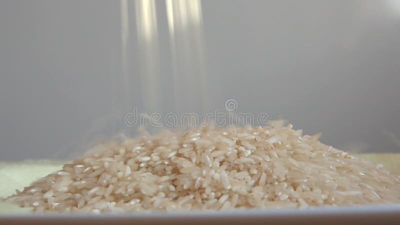 Rice Falling from Height in a Dish Stock Footage - Video of steel, food ...