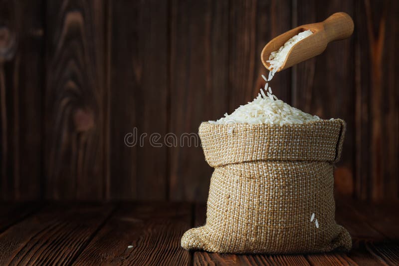 Rice Falling Scoop Burlap Sack Wooden Background Stock Photos - Free ...