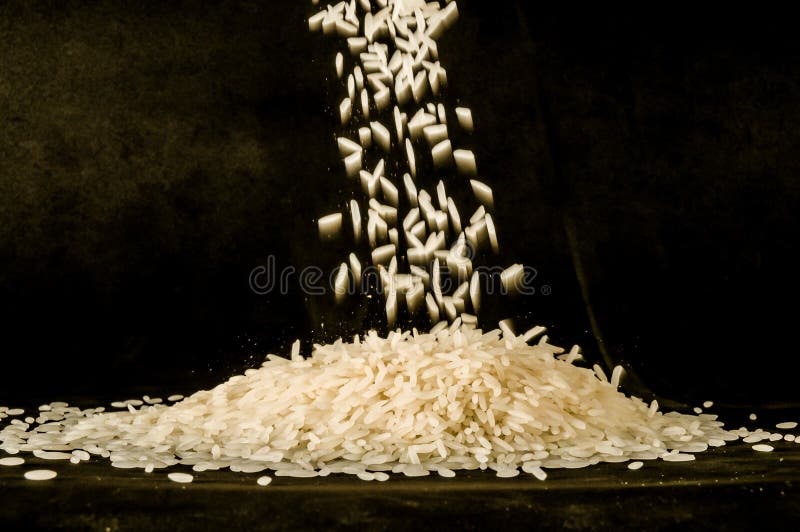 Rice Falling from the Sky in a Pile Stock Image - Image of health ...