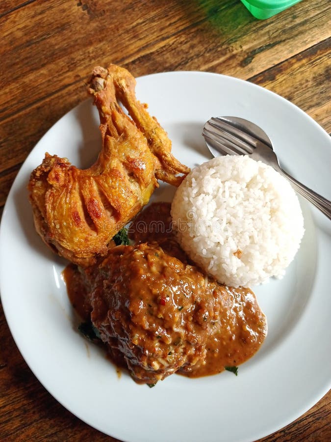 Rice with Fried Chicken and Pecel on White Plate Stock Image - Image of ...