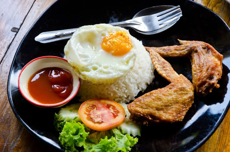 Rice with Fried Chicken Wings and Fried Egg Stock Image - Image of ...