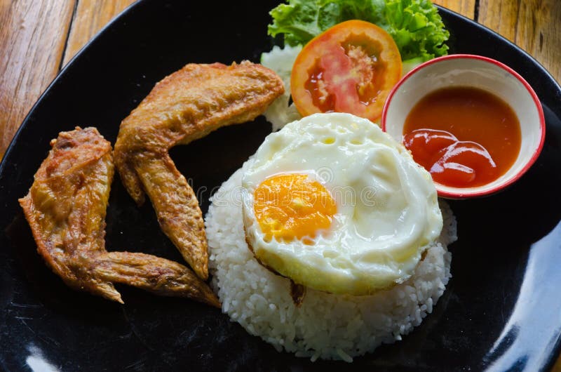 Rice with Fried Chicken Wings and Fried Egg Stock Image - Image of ...