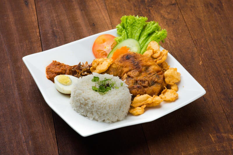 Rice with fried chicken stock image. Image of steamed - 98907881